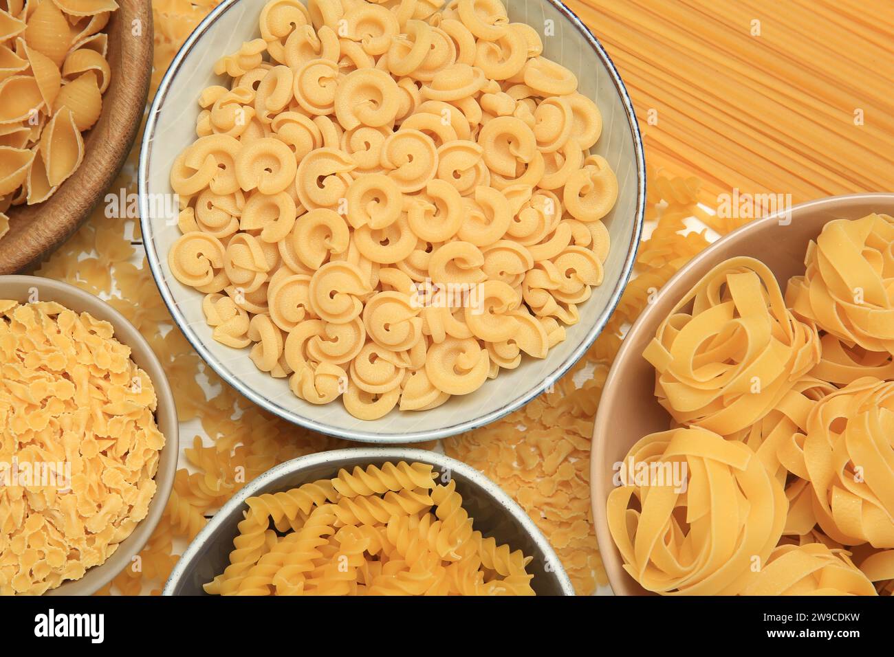 Different types of pasta on table, flat lay Stock Photo - Alamy