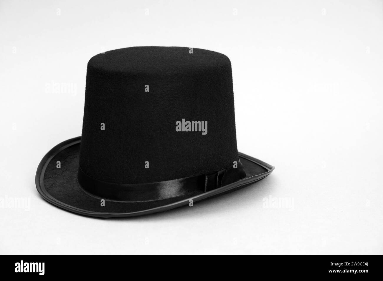 One magician top hat on white background Stock Photo - Alamy