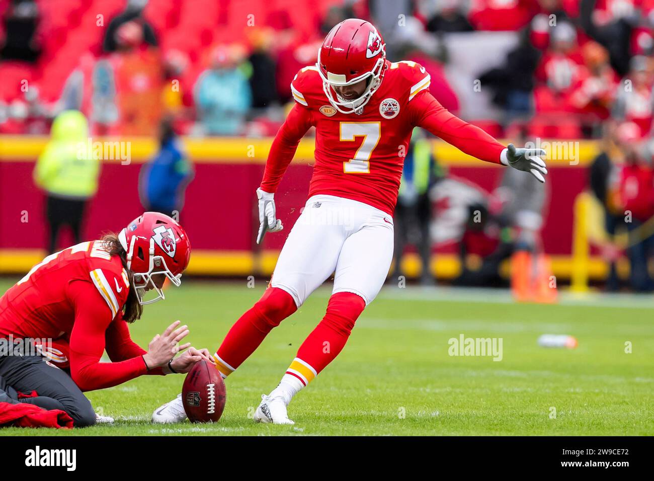 Kansas City Chiefs kicker Harrison Butker (7) goes through his kicking ...