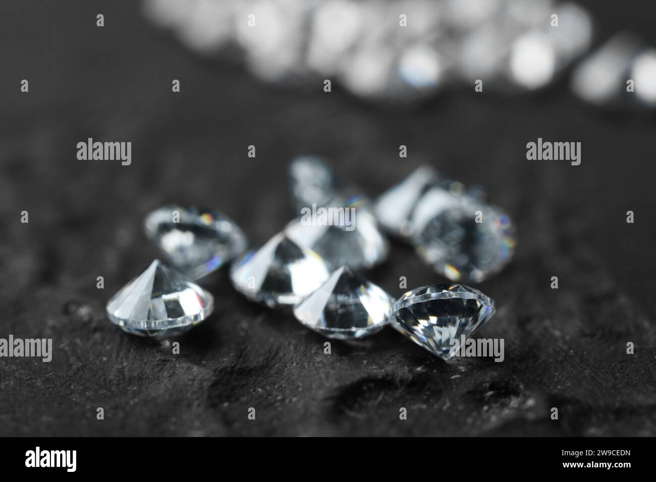 Many beautiful shiny diamonds on dark background Stock Photo - Alamy