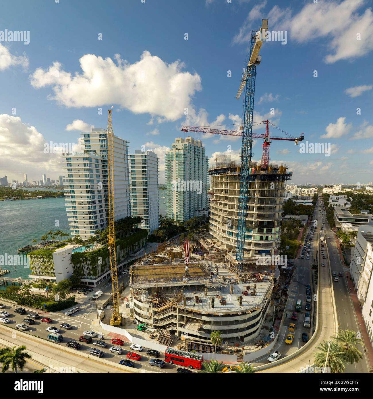 Tower lifting cranes at high residential apartment building ...