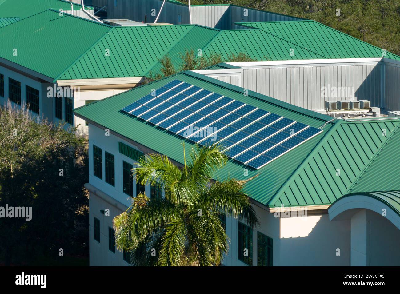 Top view of residential condo in USA with rooftop covered with solar ...