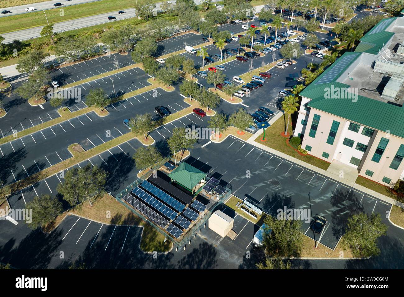 Fenced backyard facility with solar photovoltaic panels for producing ...