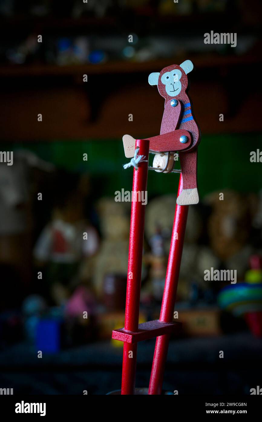 Traditional wood toy acrobat, monkey on a stick, squeeze toy Stock ...