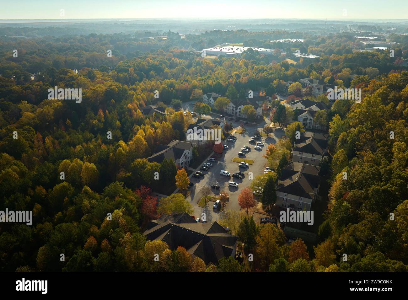 View from above of apartment residential condos between yellow fall ...