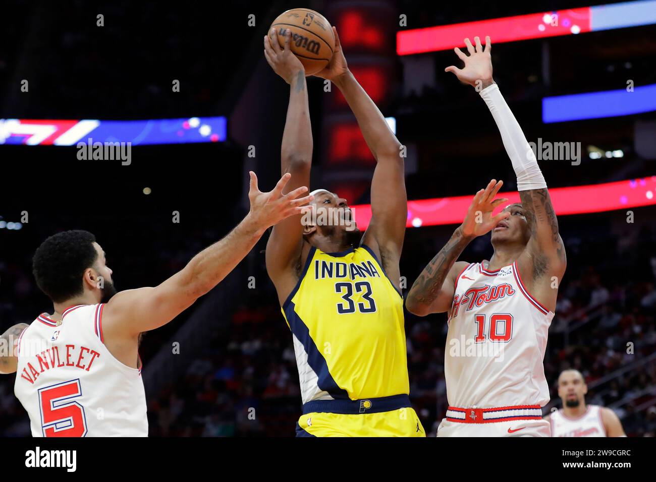 Indiana Pacers center Myles Turner (33) shoots from between Houston ...
