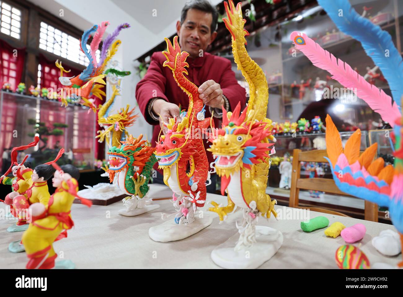 LINYI, CHINA - DECEMBER 26, 2023 - Dough sculpture artist Zuo Ansheng ...