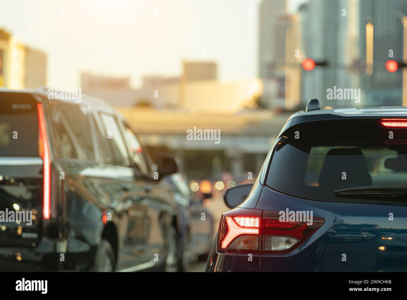Cars traffic driving at intersection on American street with traffic ...
