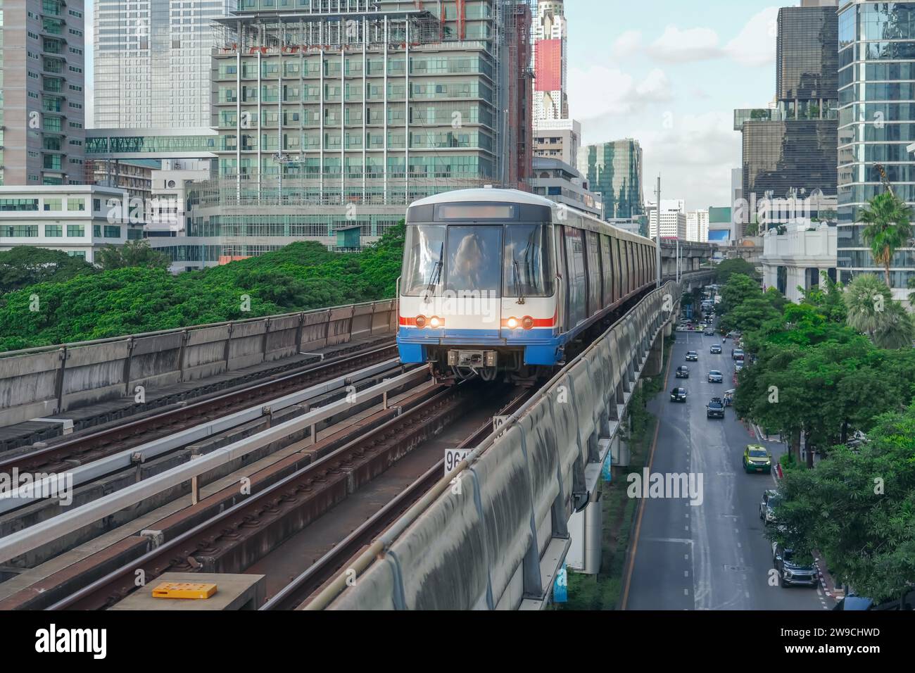 Electric train railway carriage rushes travels along route in sky ...