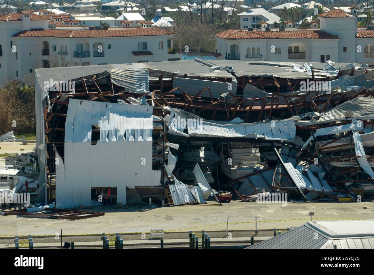 Warehouse with motorboats and yachts destroyed by hurricane winds in ...
