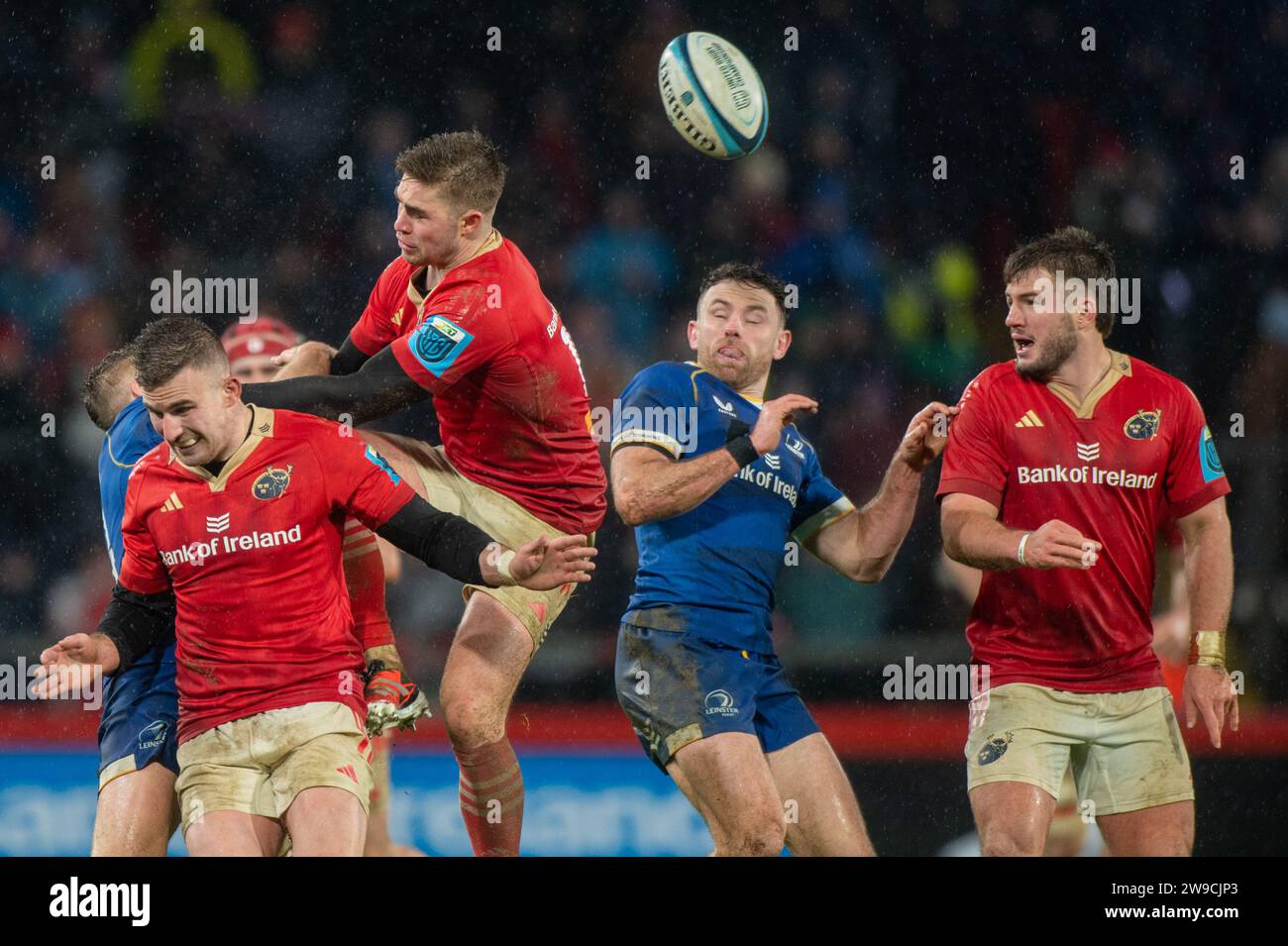 Limerick, Ireland. 27th Dec, 2023. Jack Crowley of Munster jumps for ...
