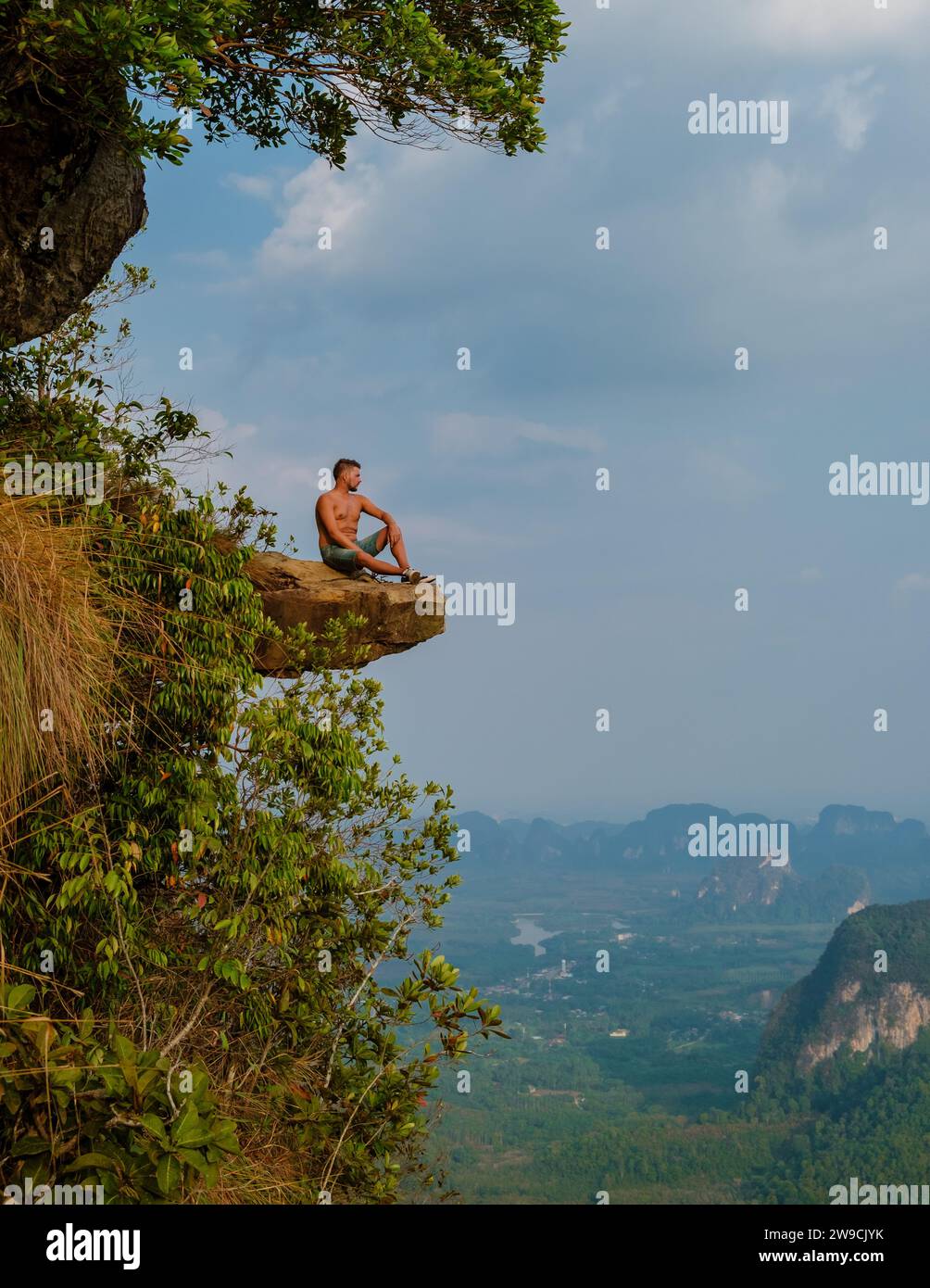 young men at the edge of a mountain, Dragon Crest Mountain Krabi ...