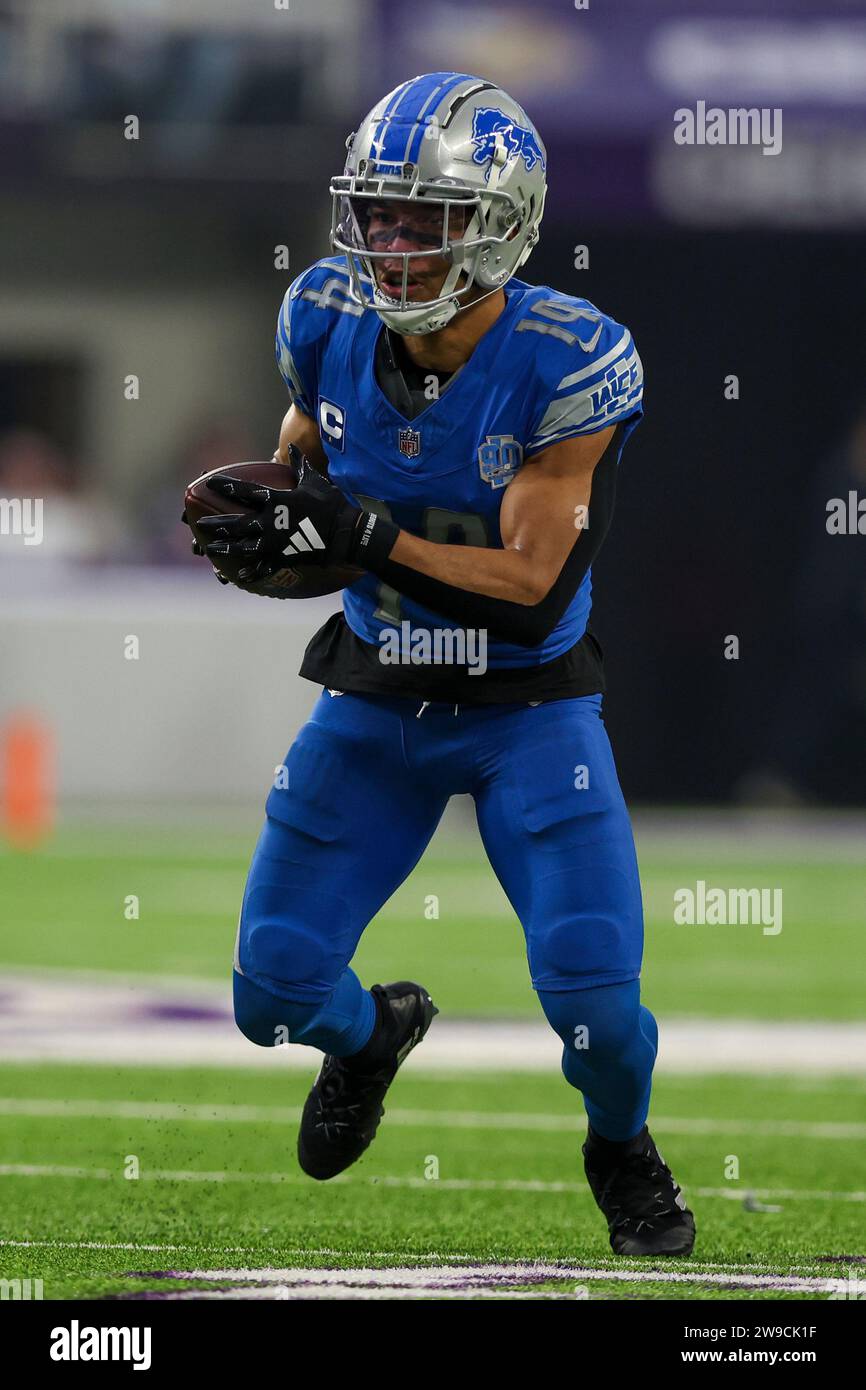 Detroit Lions wide receiver Amon-Ra St. Brown (14) handles the ball ...