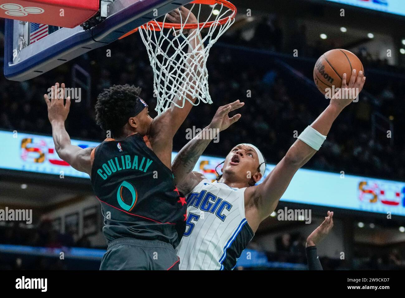 Orlando Magic forward Paolo Banchero (5) shoots over Washington Wizards ...