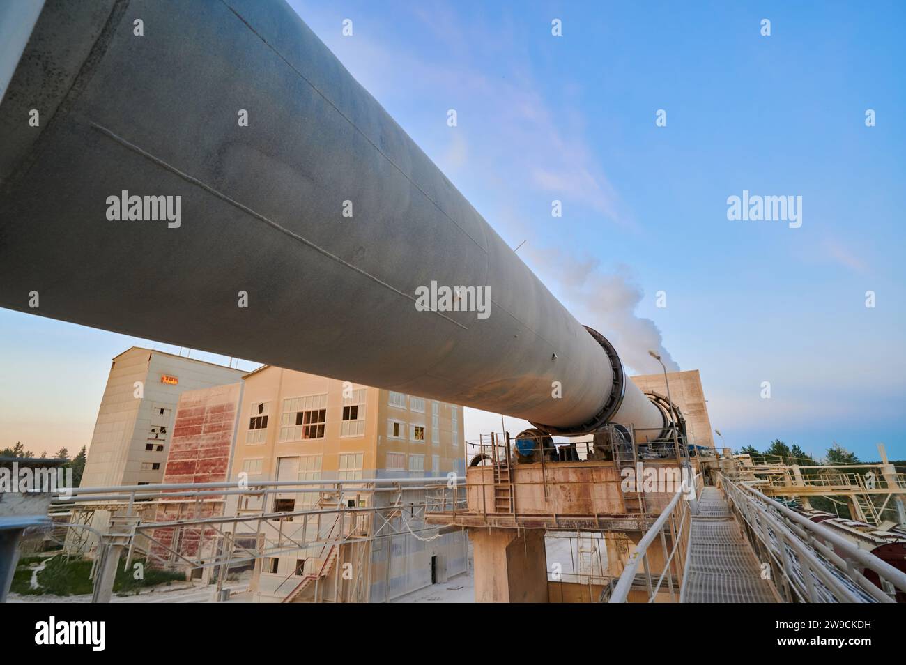 Tubular rotary furnace for limestone roasting in evening Stock Photo ...