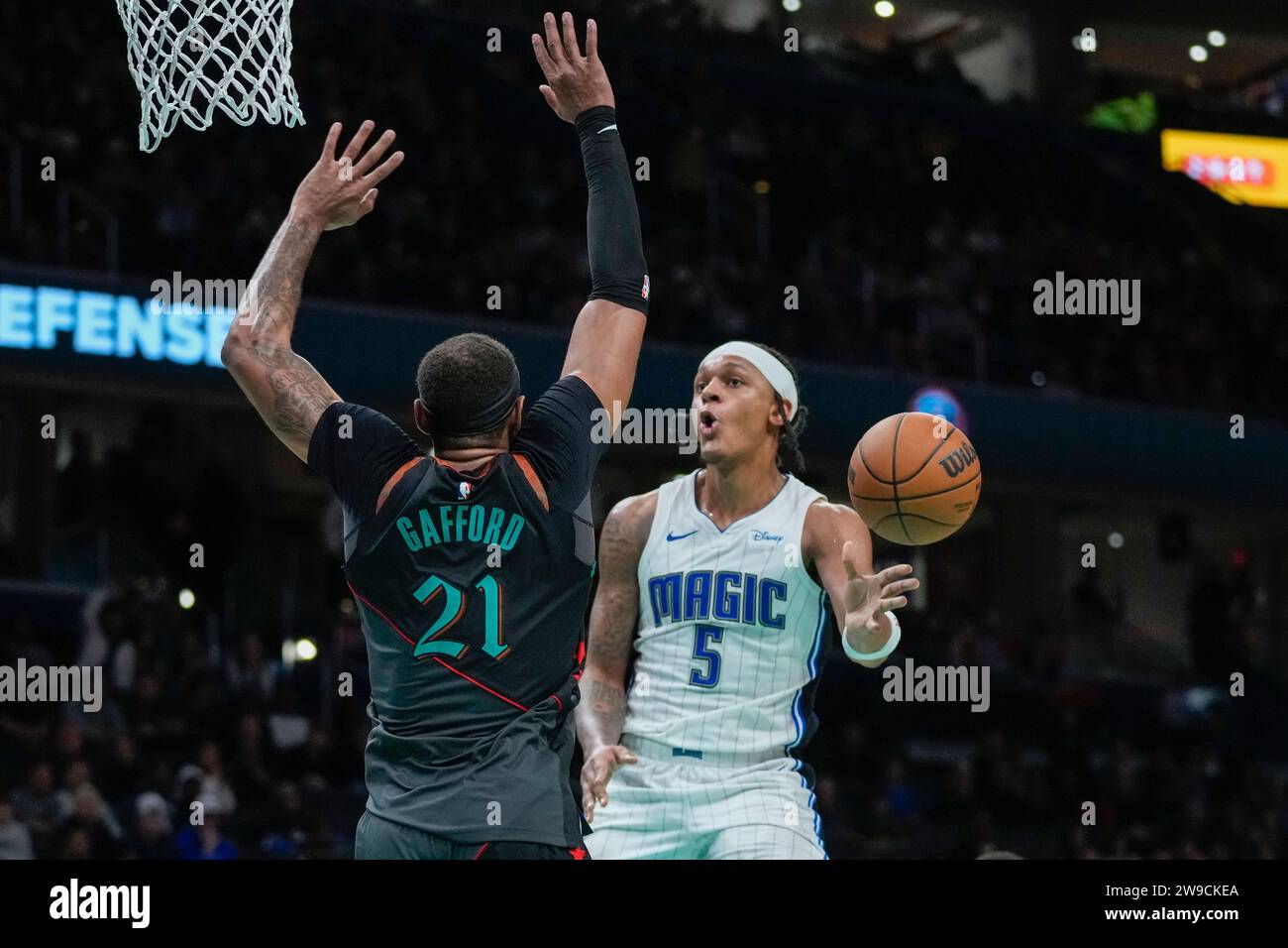 Orlando Magic forward Paolo Banchero (5) passes the ball in front of Washington Wizards center ...
