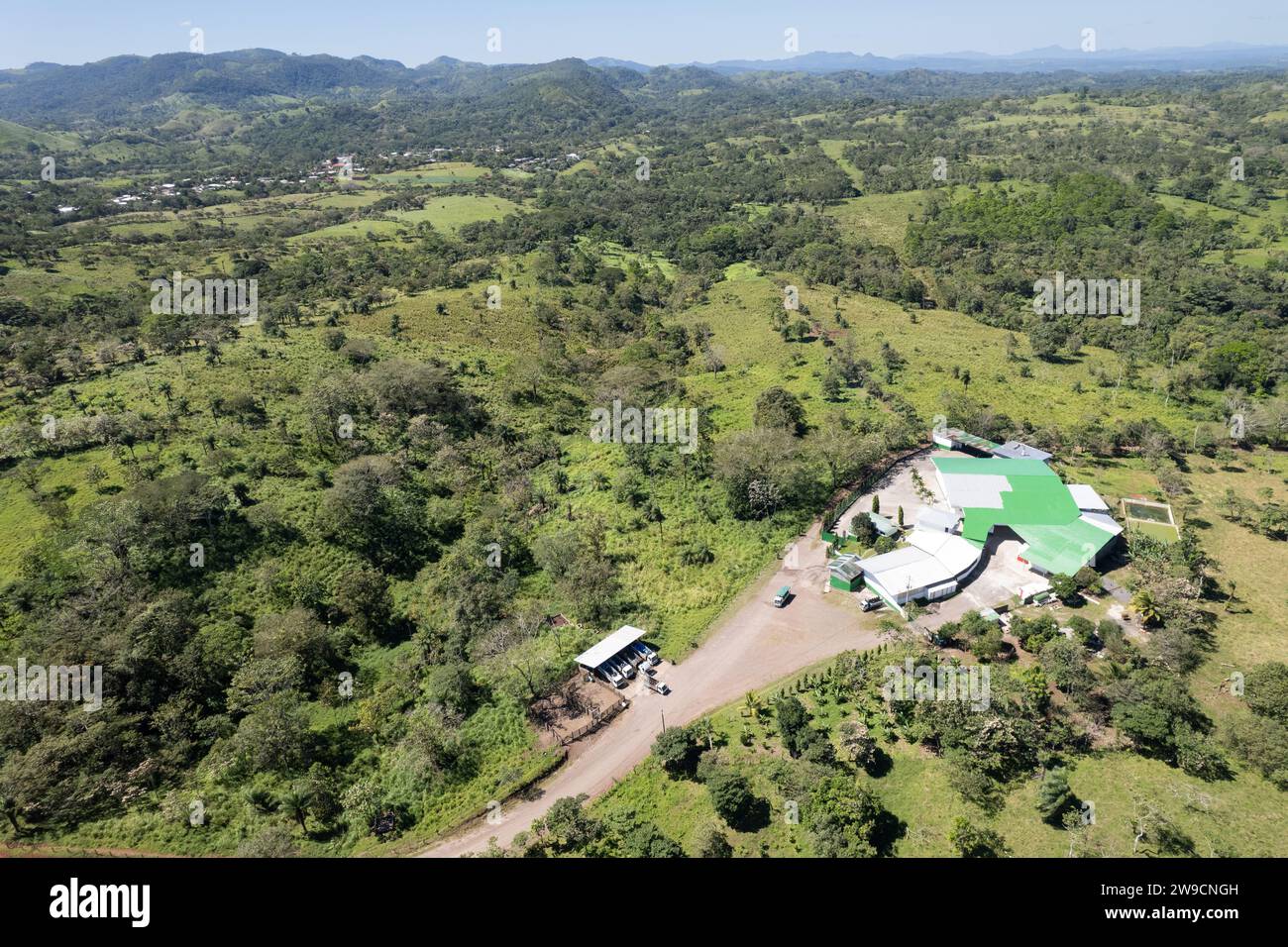 Industrial farm barn aerial drone view on green nature background Stock ...