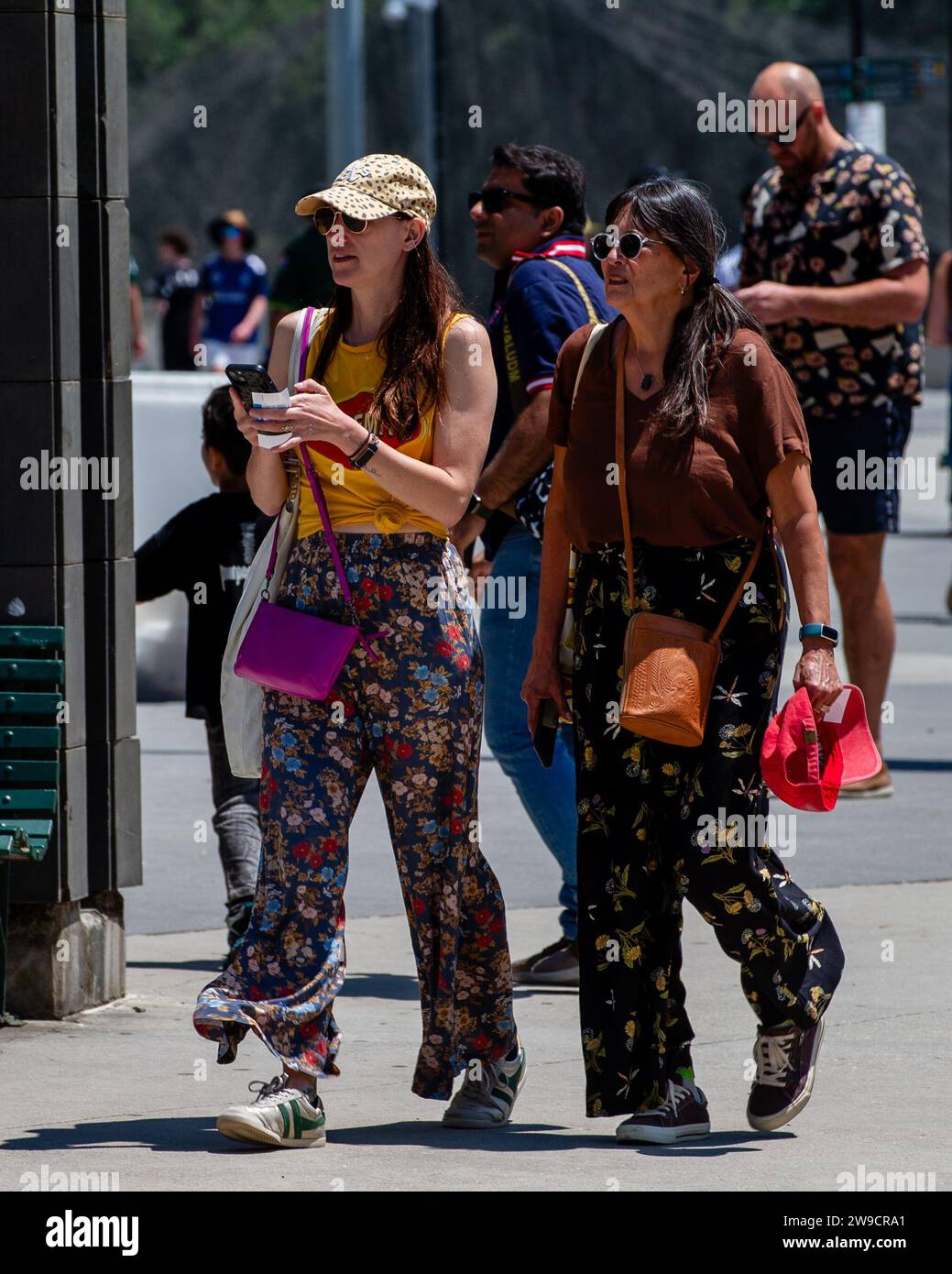 Melbourne, Australia, 27 December, 2023. Two female cricket fans arrive ...