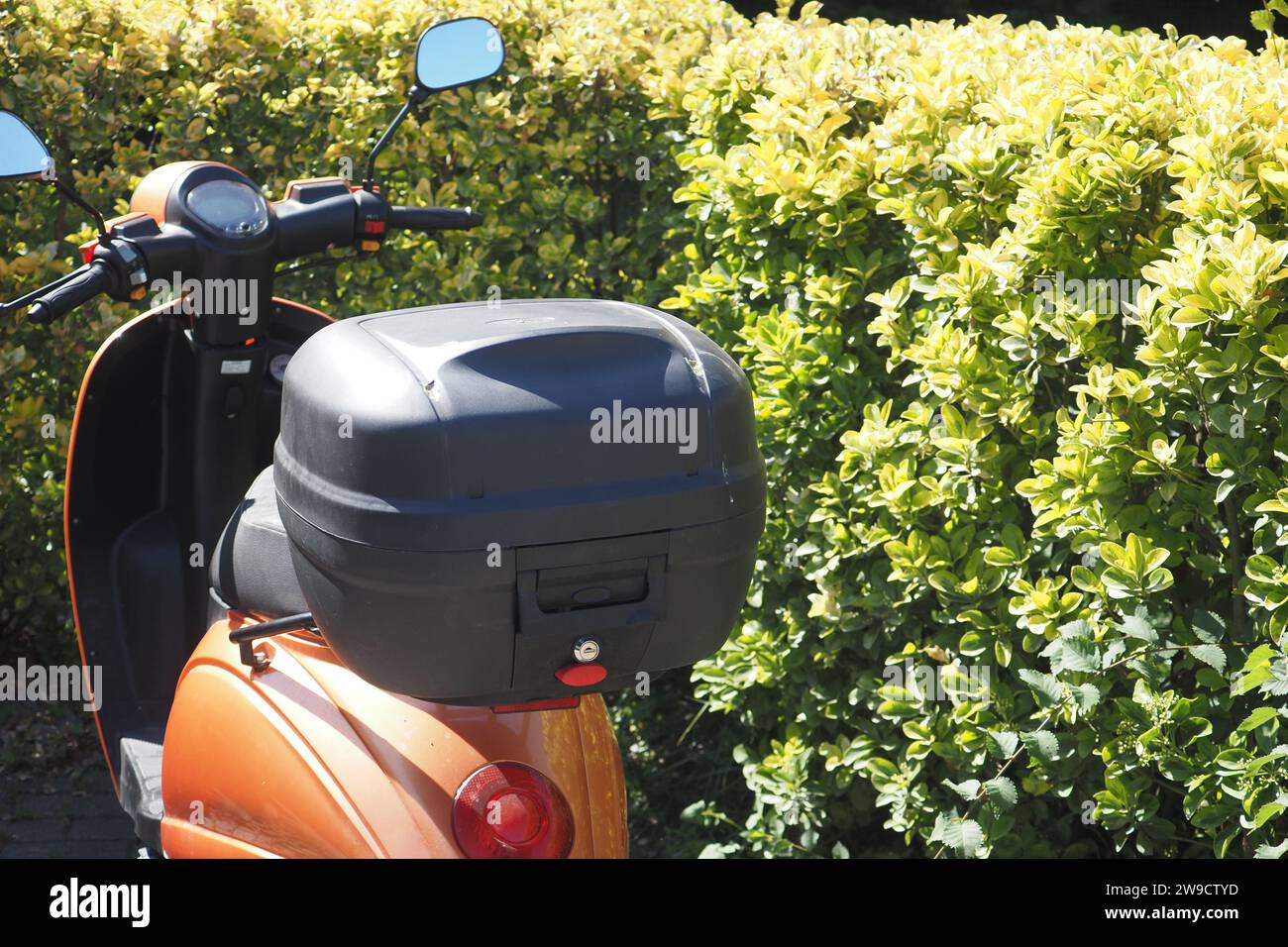Storage box on back of motorcycle Stock Photo - Alamy