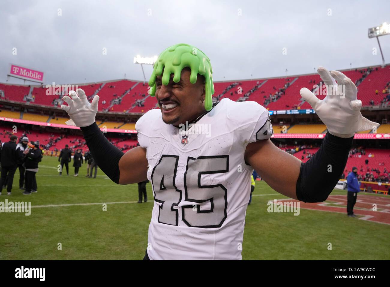 Las Vegas Raiders fullback Jakob Johnson (45) wears a Nickelodeon slime ...