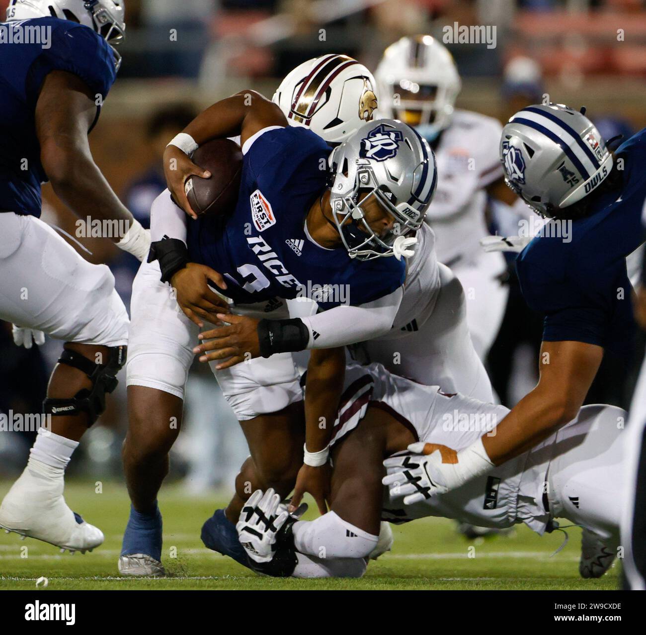 December 26, 2023: Texas State defensive end Jordan Revels (8) and ...