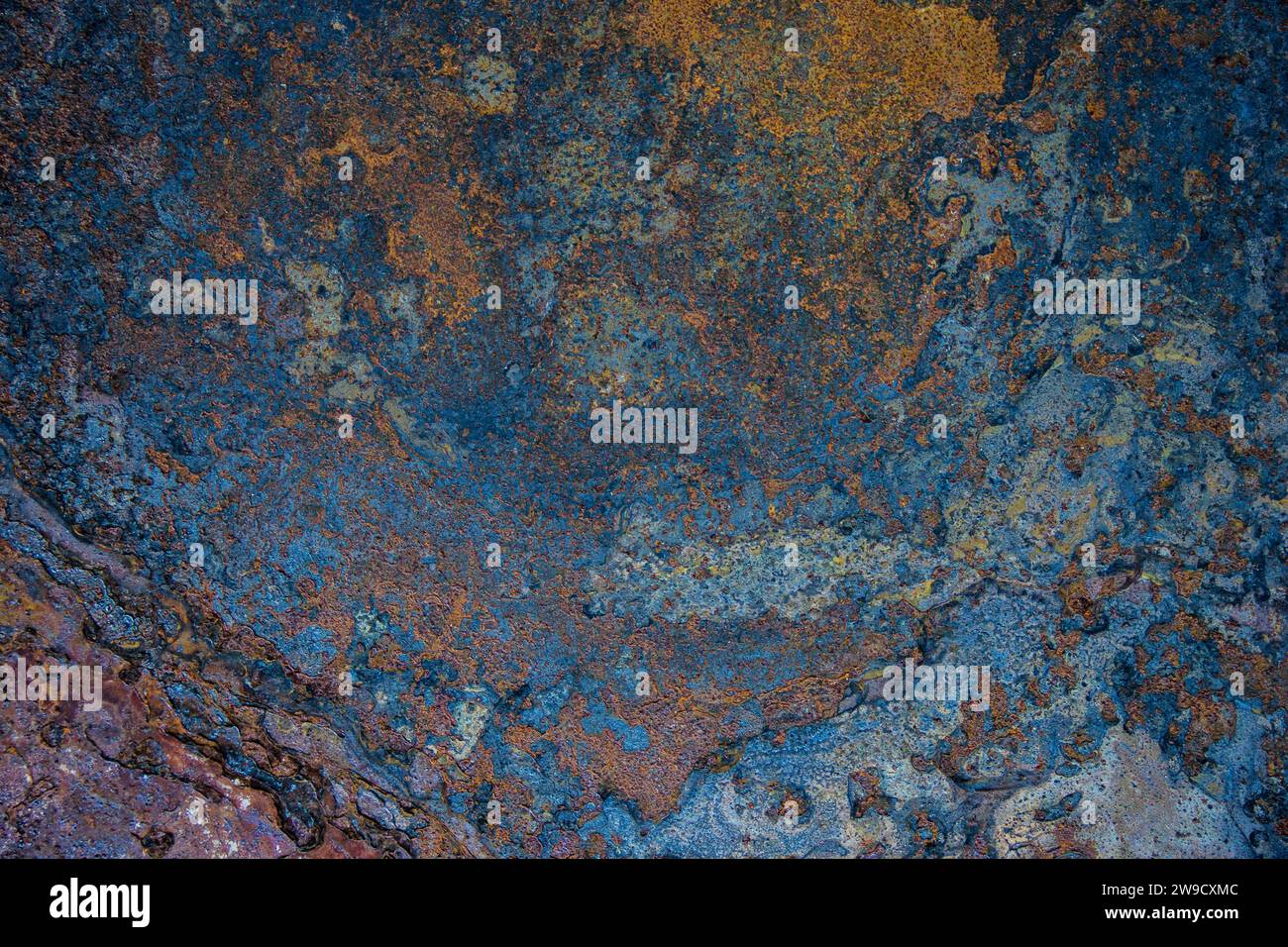 A close-up of a rust-covered rock with a distressed, aged texture Stock ...