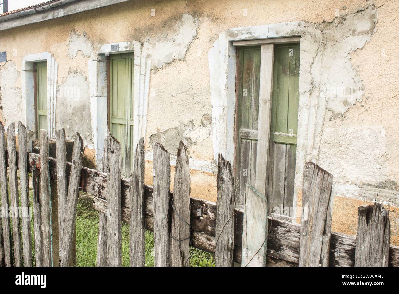 An old, weathered building with vintage windows Stock Photo - Alamy