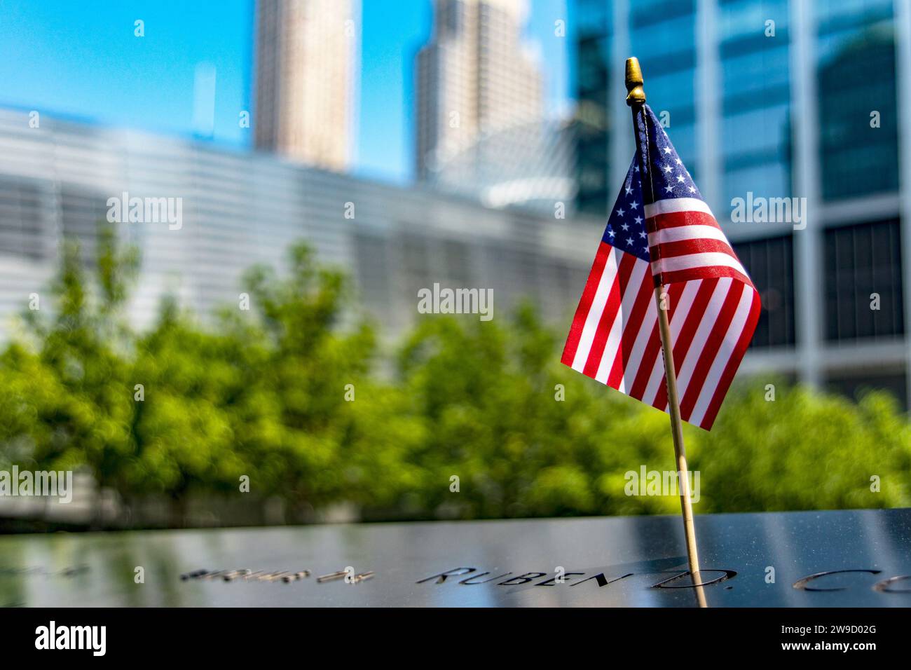 Mural, waterfall and American flag at the site of the twin towers in ...