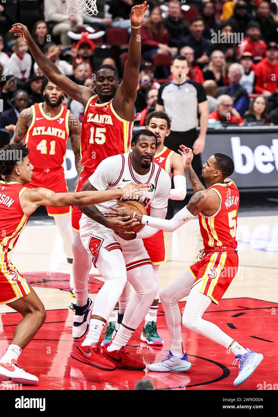 Chicago, USA. 26th Dec, 2023. Andre Drummond (C) of Chicago Bulls grabs ...
