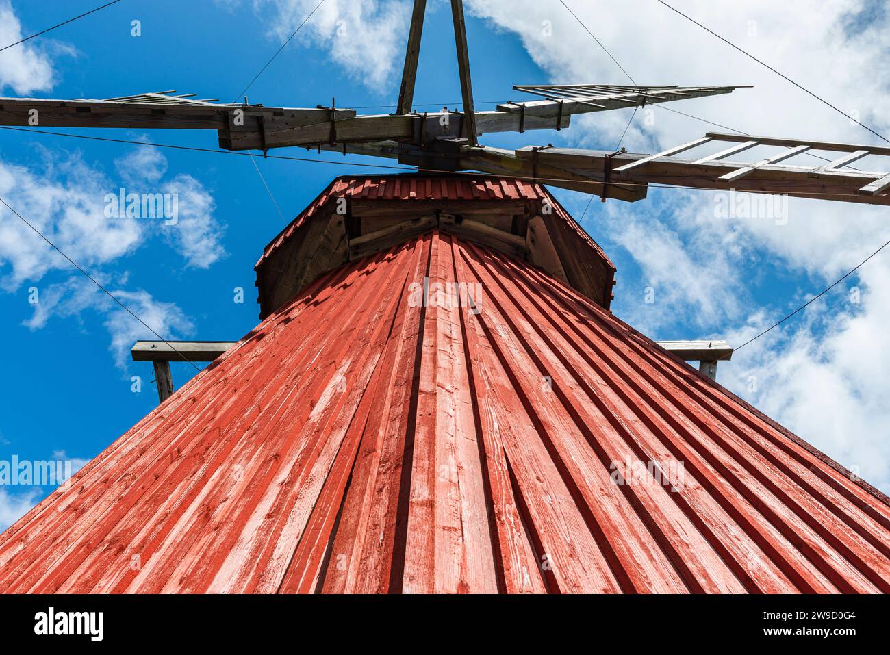 Ulseröd windmill with wooden façade in red colour on a hill near ...