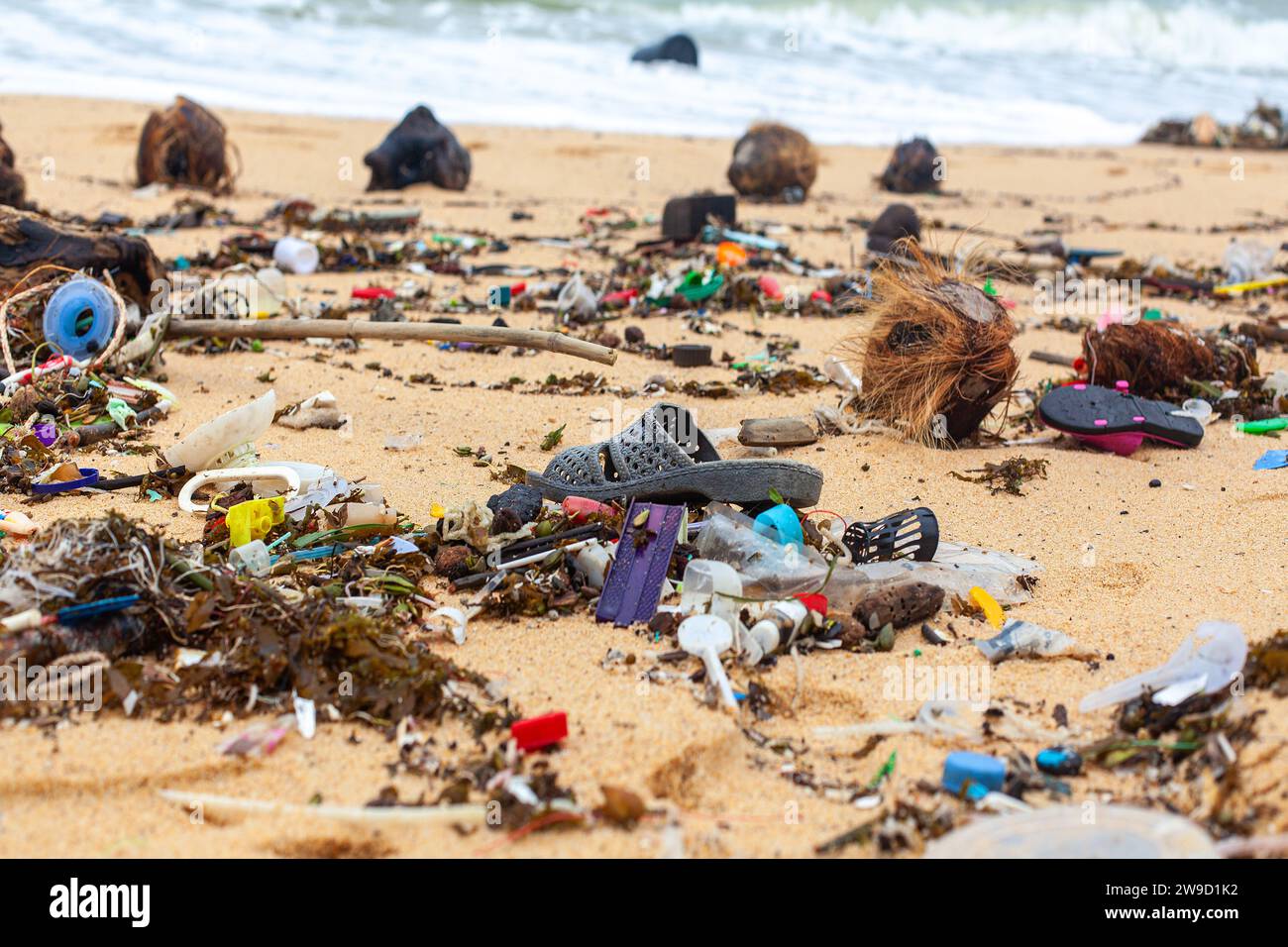 Garbage on sea beach, dirty ocean water, environmental pollution ...