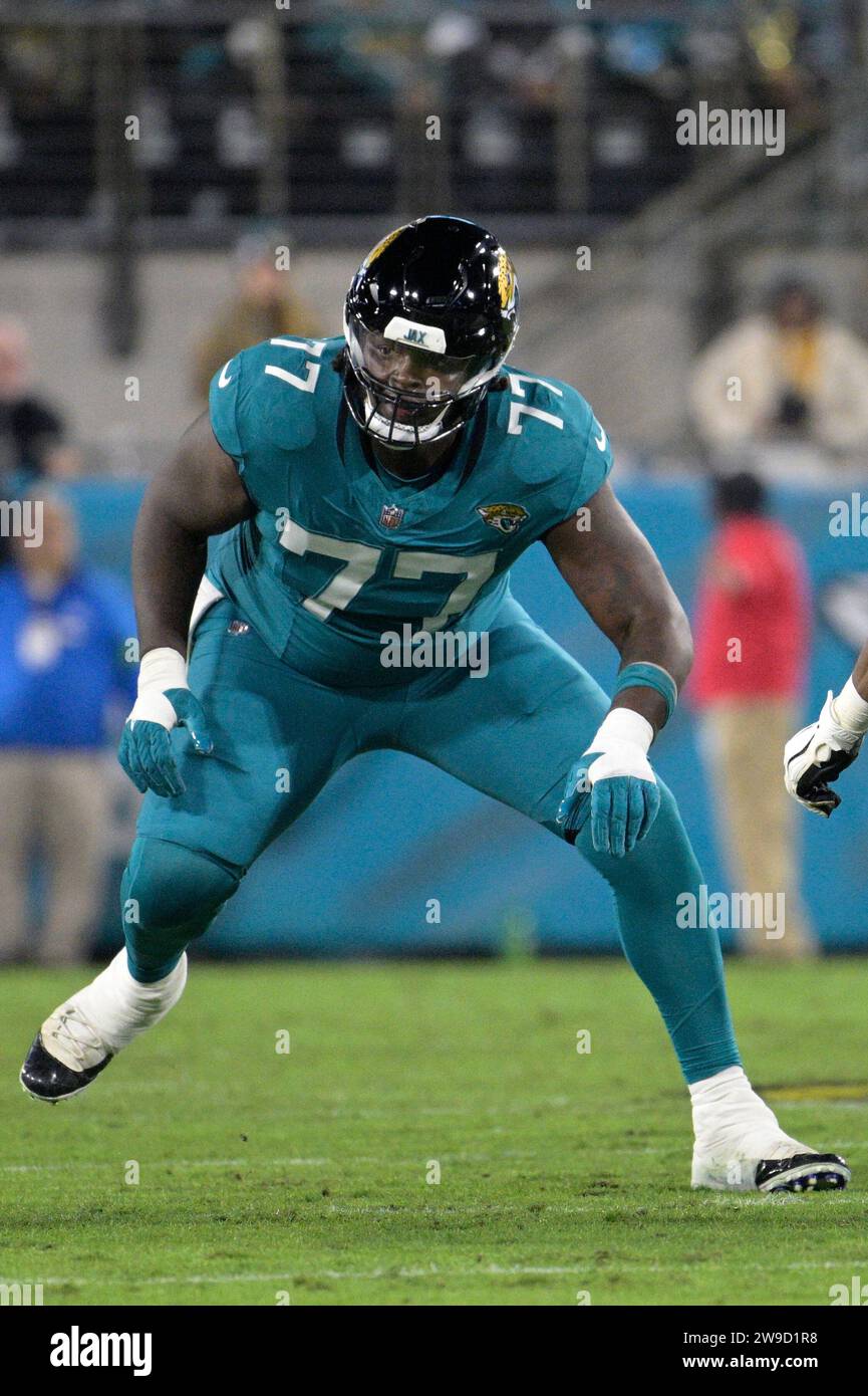 Jacksonville Jaguars offensive tackle Anton Harrison (77) sets up for a ...