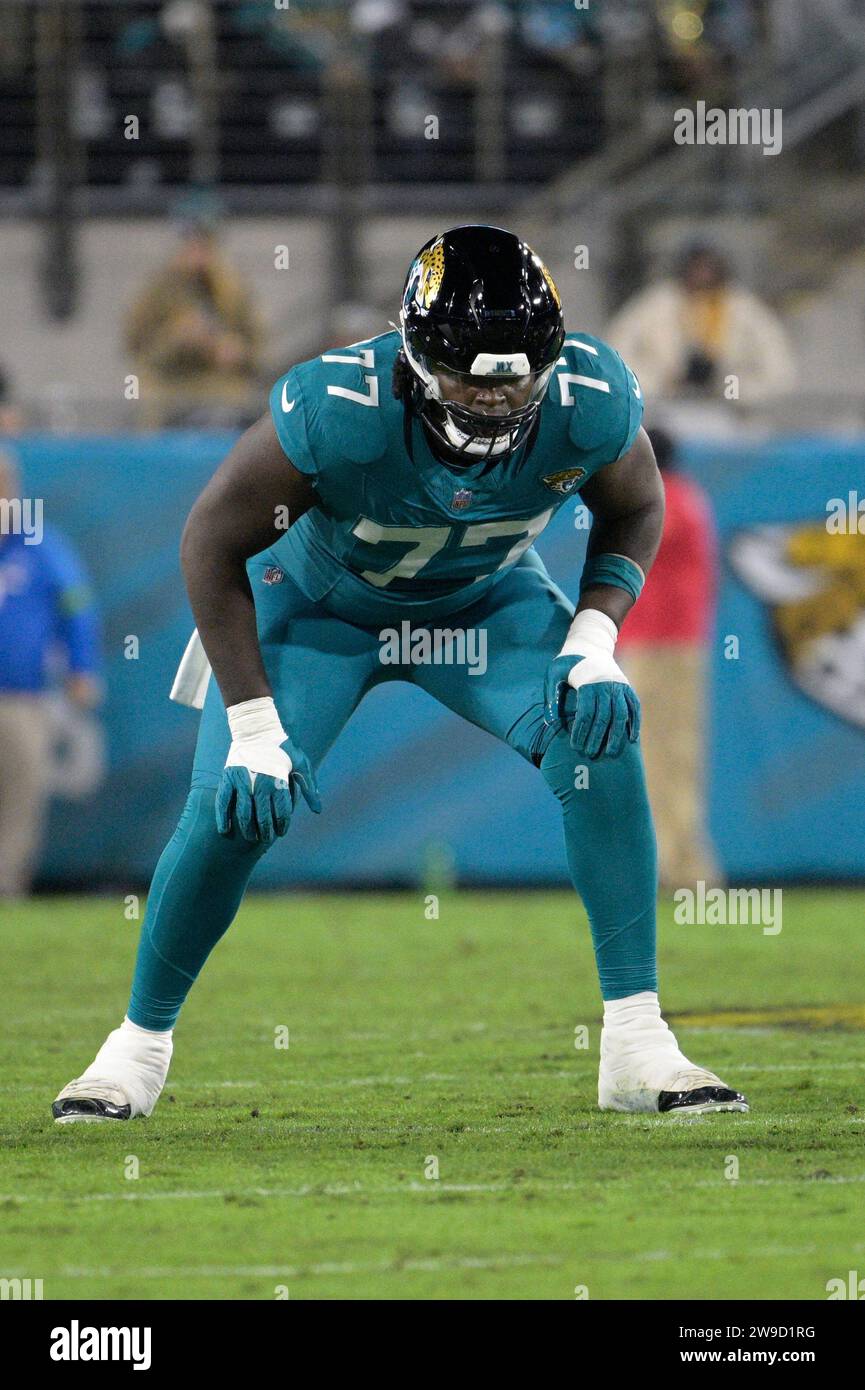 Jacksonville Jaguars offensive tackle Anton Harrison (77) sets up for a ...