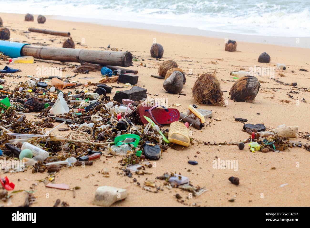 Garbage on sea beach, dirty ocean water, environmental pollution ...