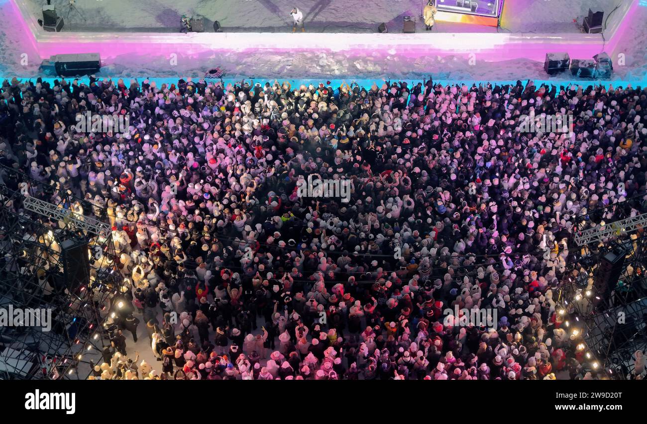Tourists take part in a party at Harbin Ice and Snow World in Harbin ...