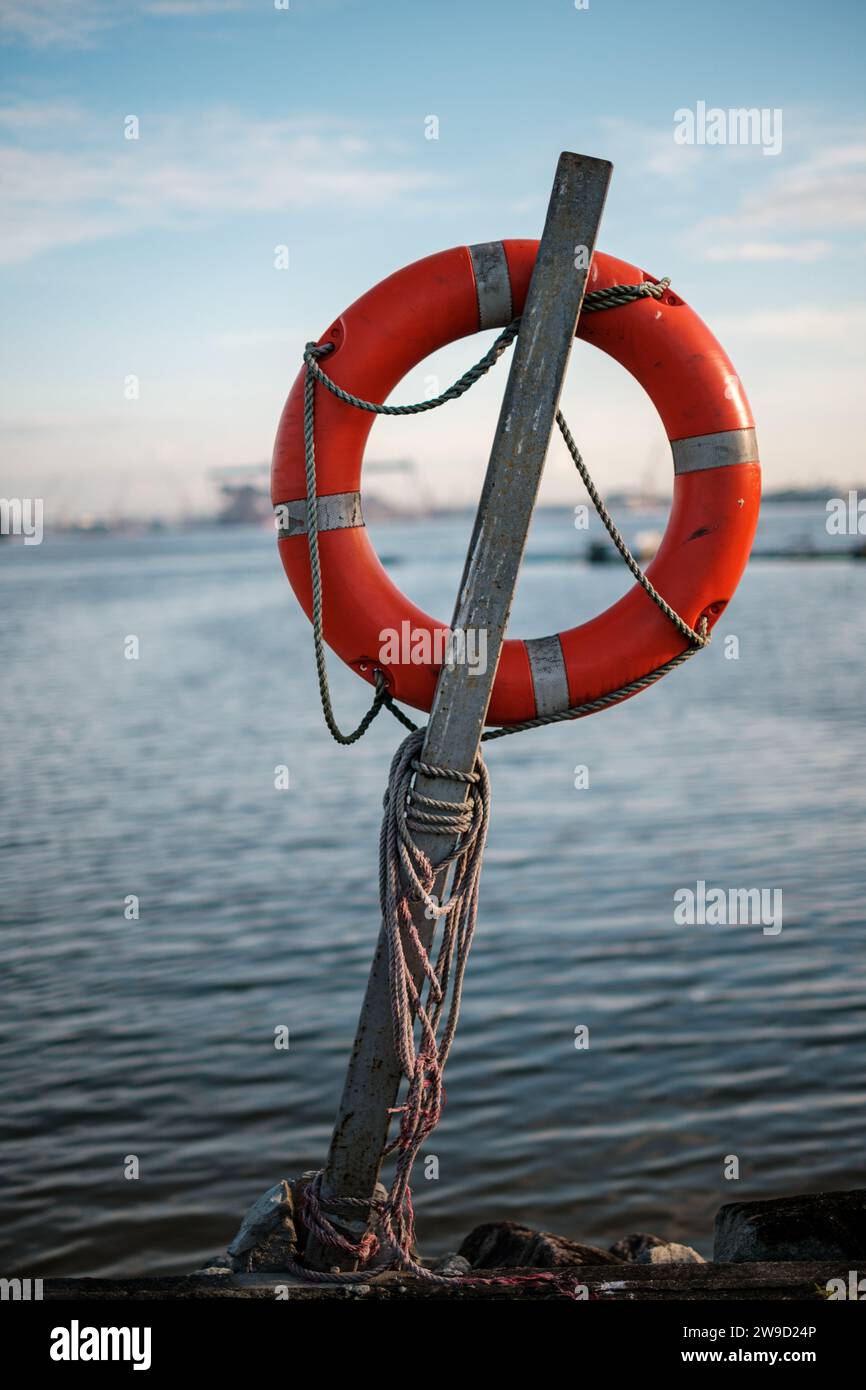 Red Life Buoy on Stick Stock Photo - Alamy