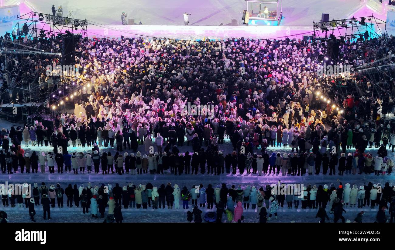 Tourists take part in a party at Harbin Ice and Snow World in Harbin ...