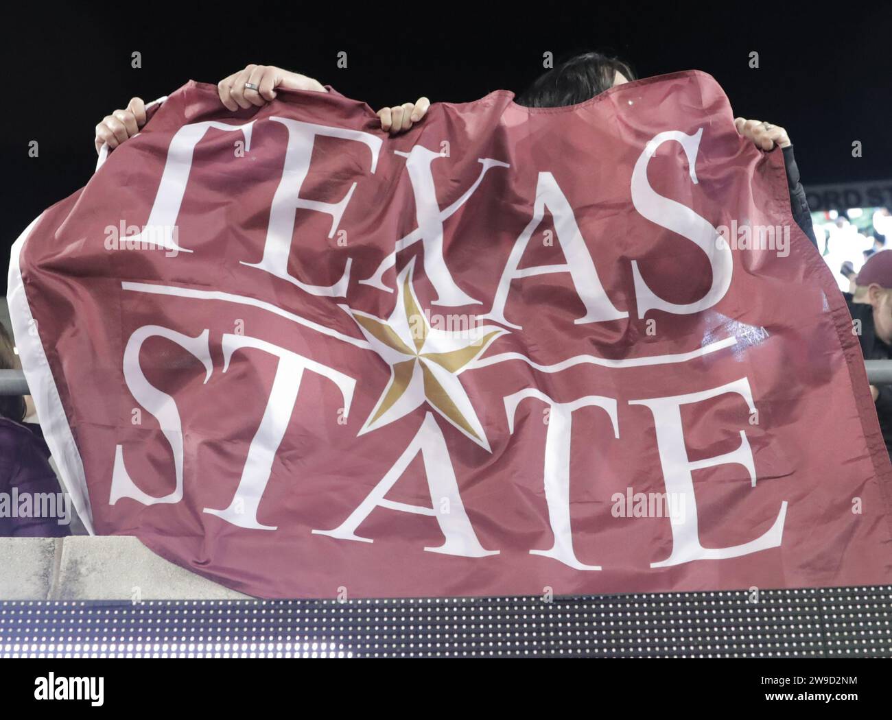 Dallas, Texas, USA. 26th Dec, 2023. Rowdy Texas State fans seated in ...