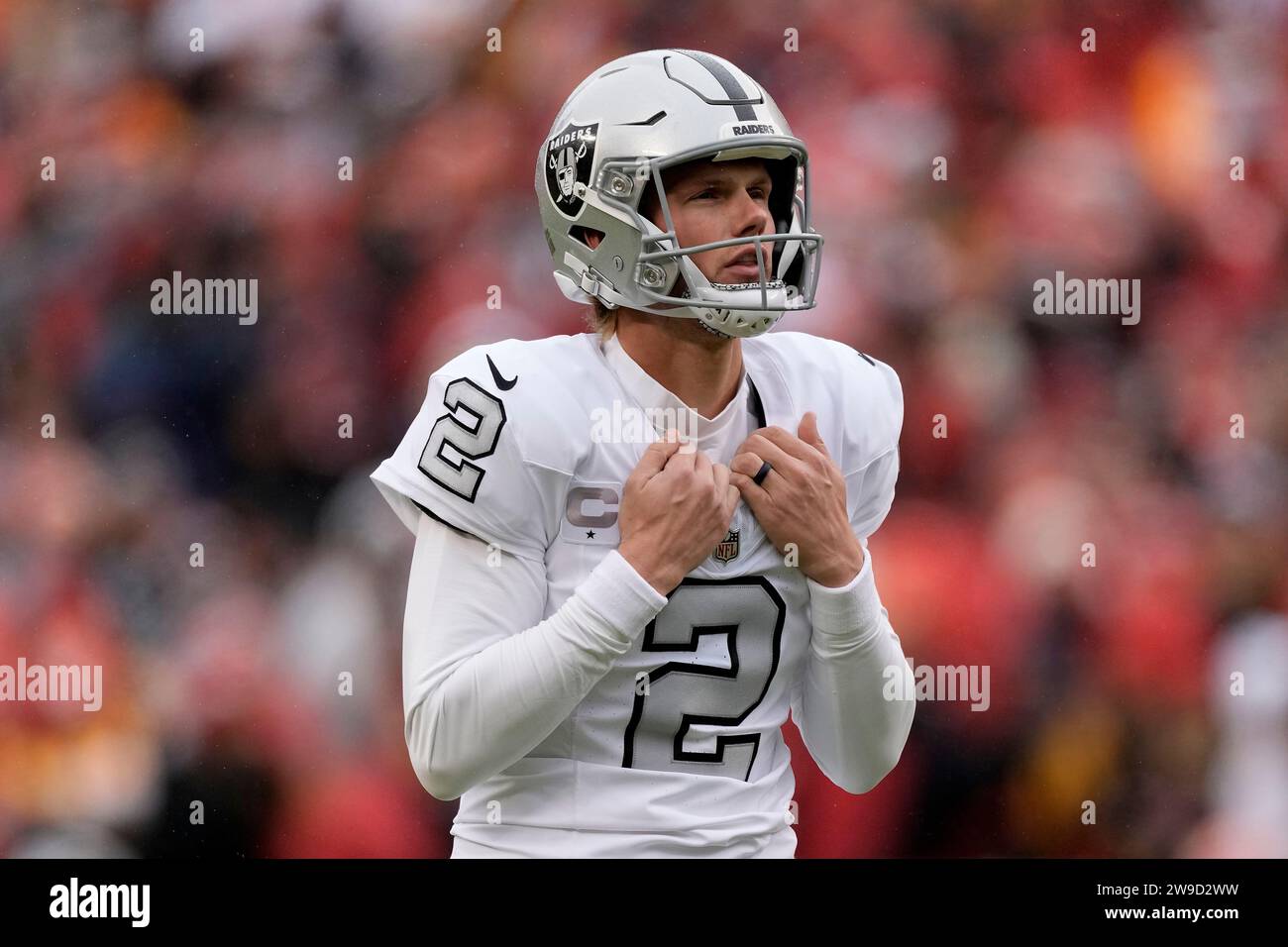 Las Vegas Raiders place kicker Daniel Carlson watches his kick during ...