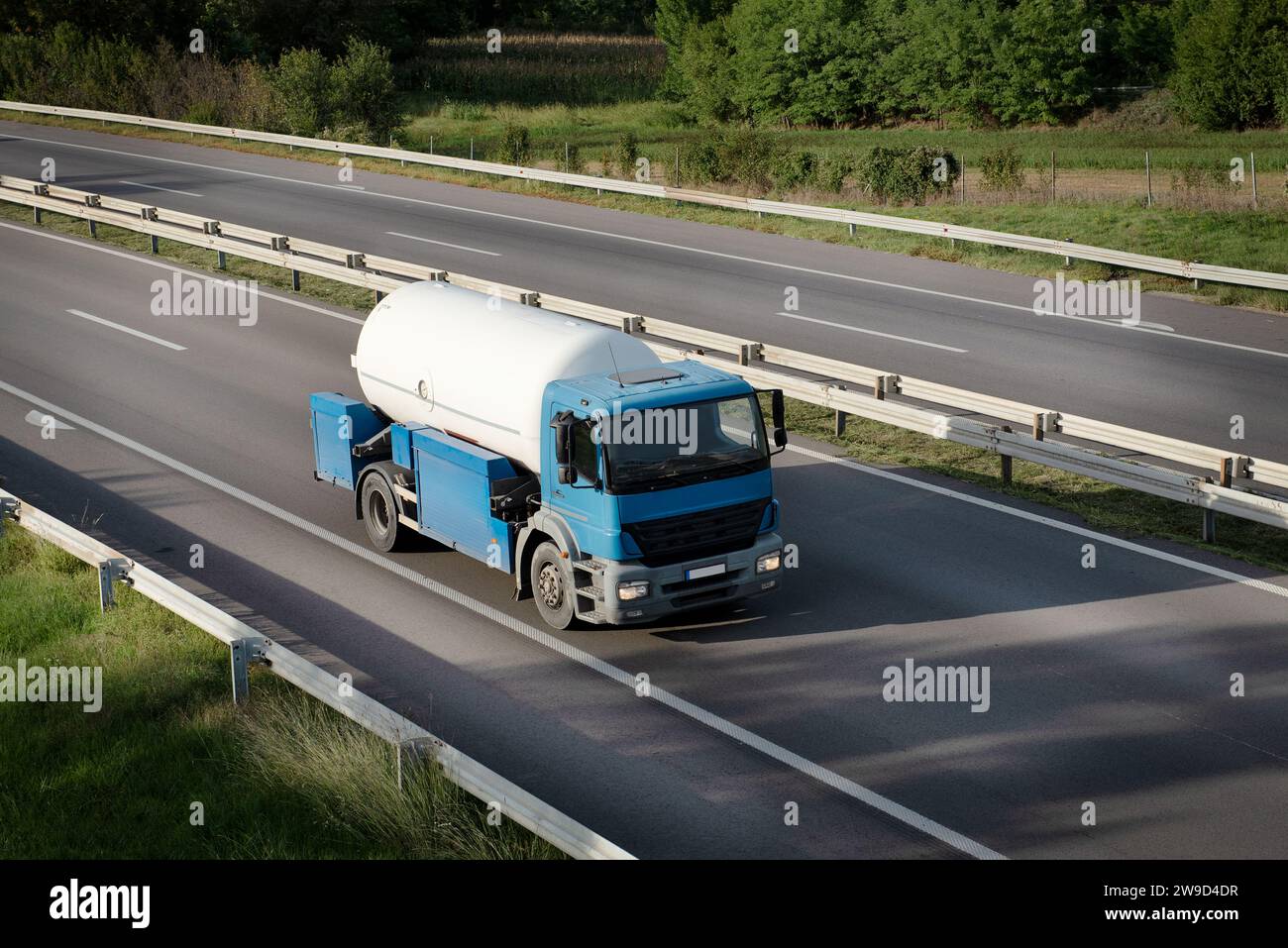 Orange road tanker moving hi-res stock photography and images - Alamy