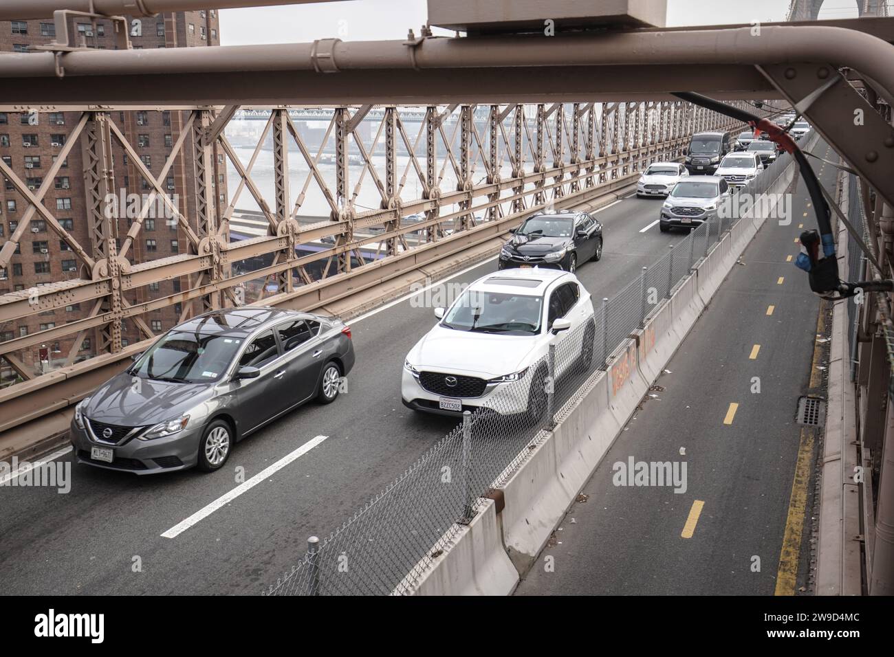New York, United States. 26th Dec, 2023. Cars drive along the Brooklyn ...