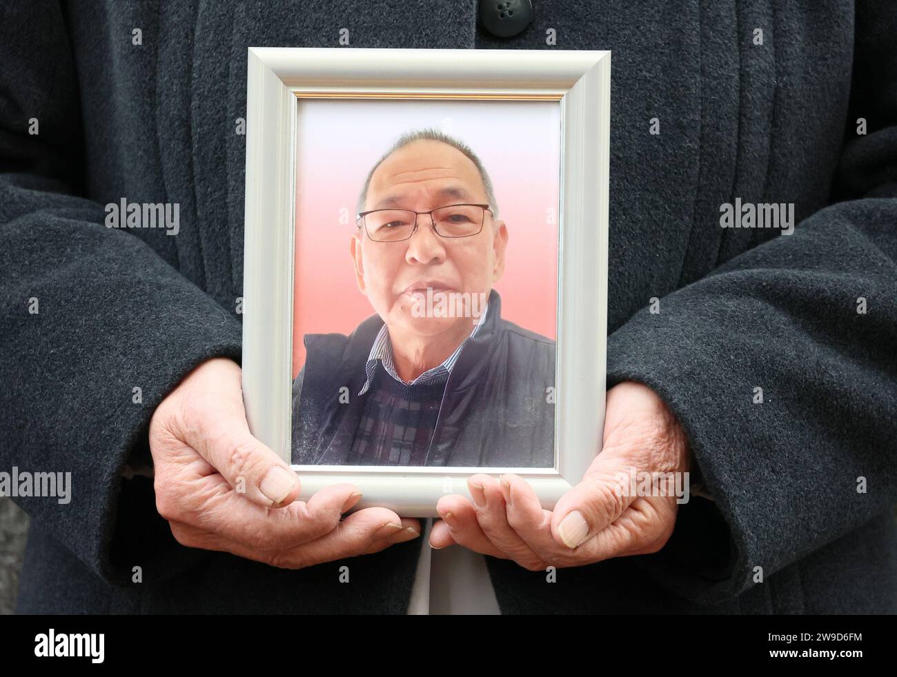 Tokyo, Japan. 27th Dec, 2023. Wife of Japanese machinery maker Ohkawara ...