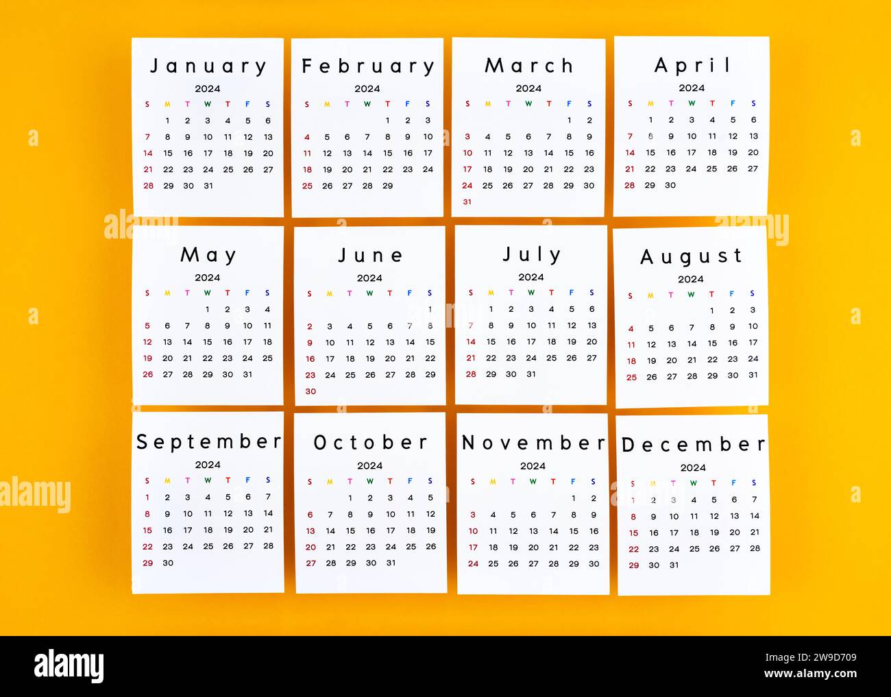 Months 1 to 12 January-December 2024 calendar page on yellow color ...