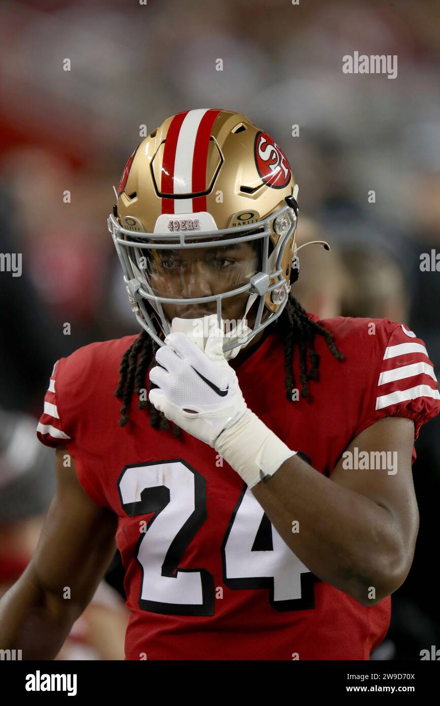 San Francisco 49ers running back Jordan Mason (24) walks on the ...