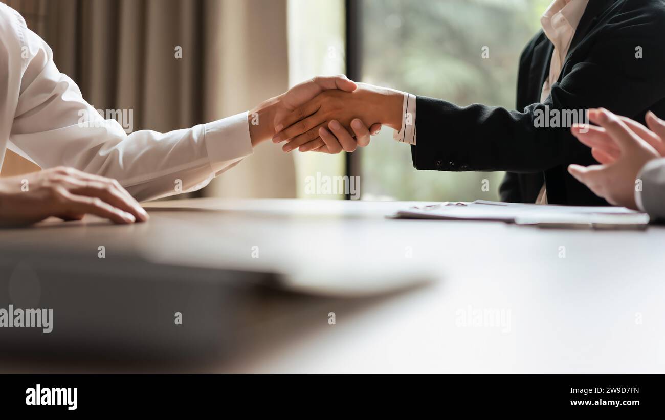 HR manager woman shaking hand and congratulation with male candidate ...