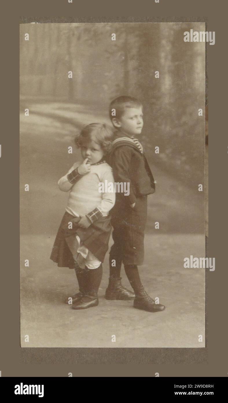 Portrait two brothers standing back hi-res stock photography and images ...