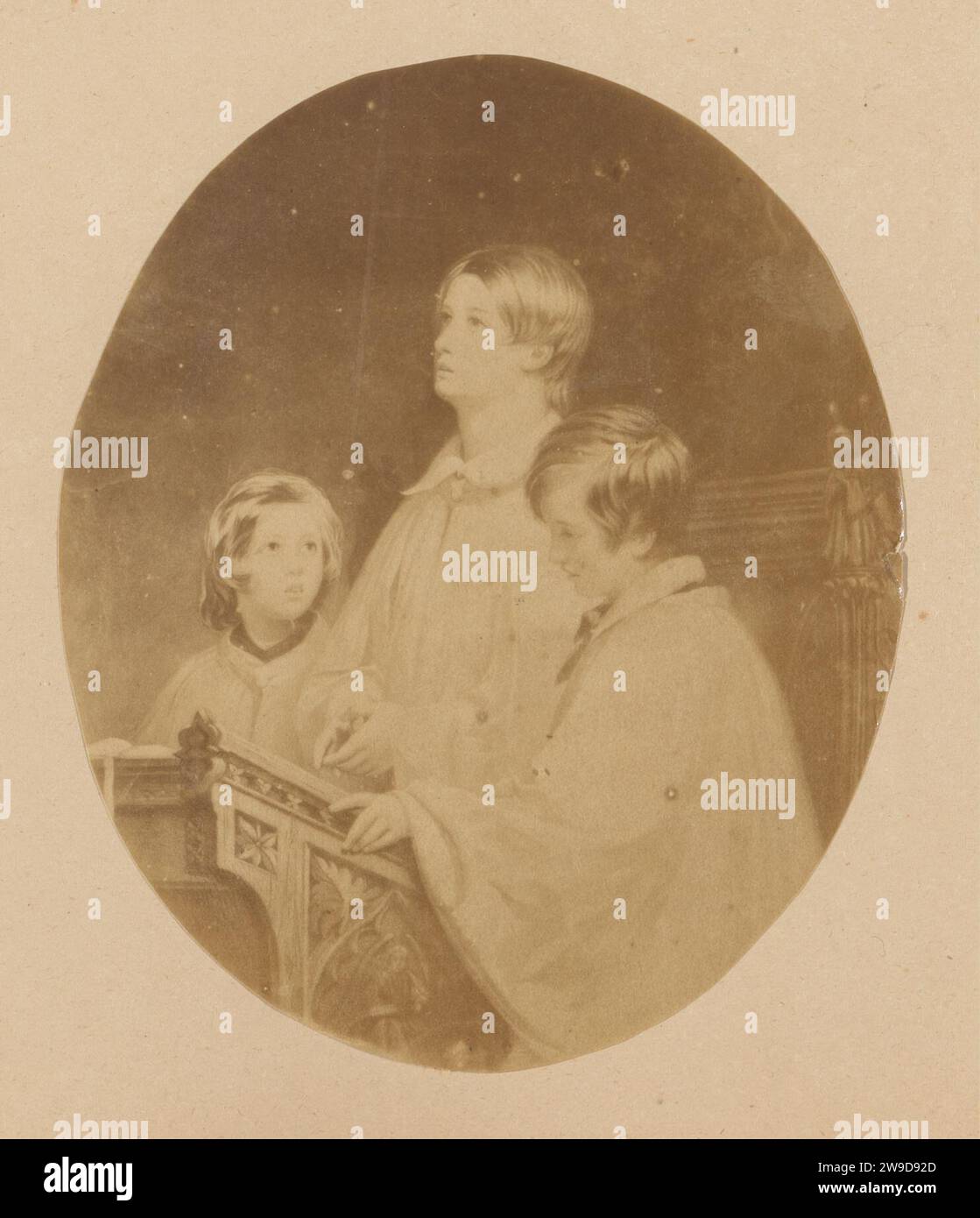 Photo production of a painting with three chorus boys behind a desk ...