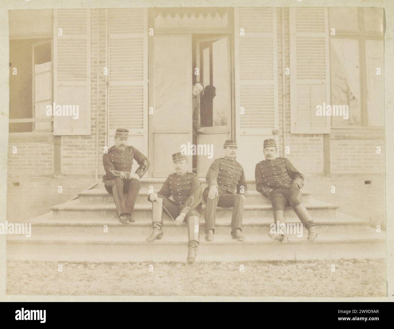 Group portrait of five French soldiers posing on the stairs in front of ...