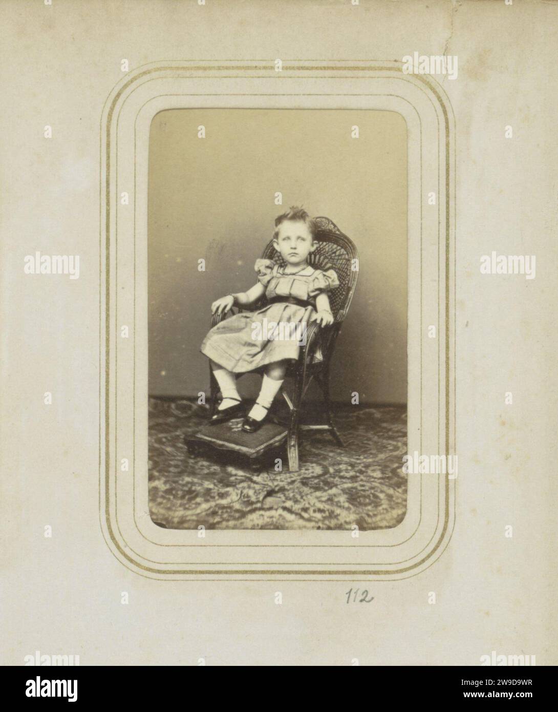 Portrait of a girl in a chair, 1870 - 1899 visit card Part of Family Album of H.W.F. Ligtenberg ...