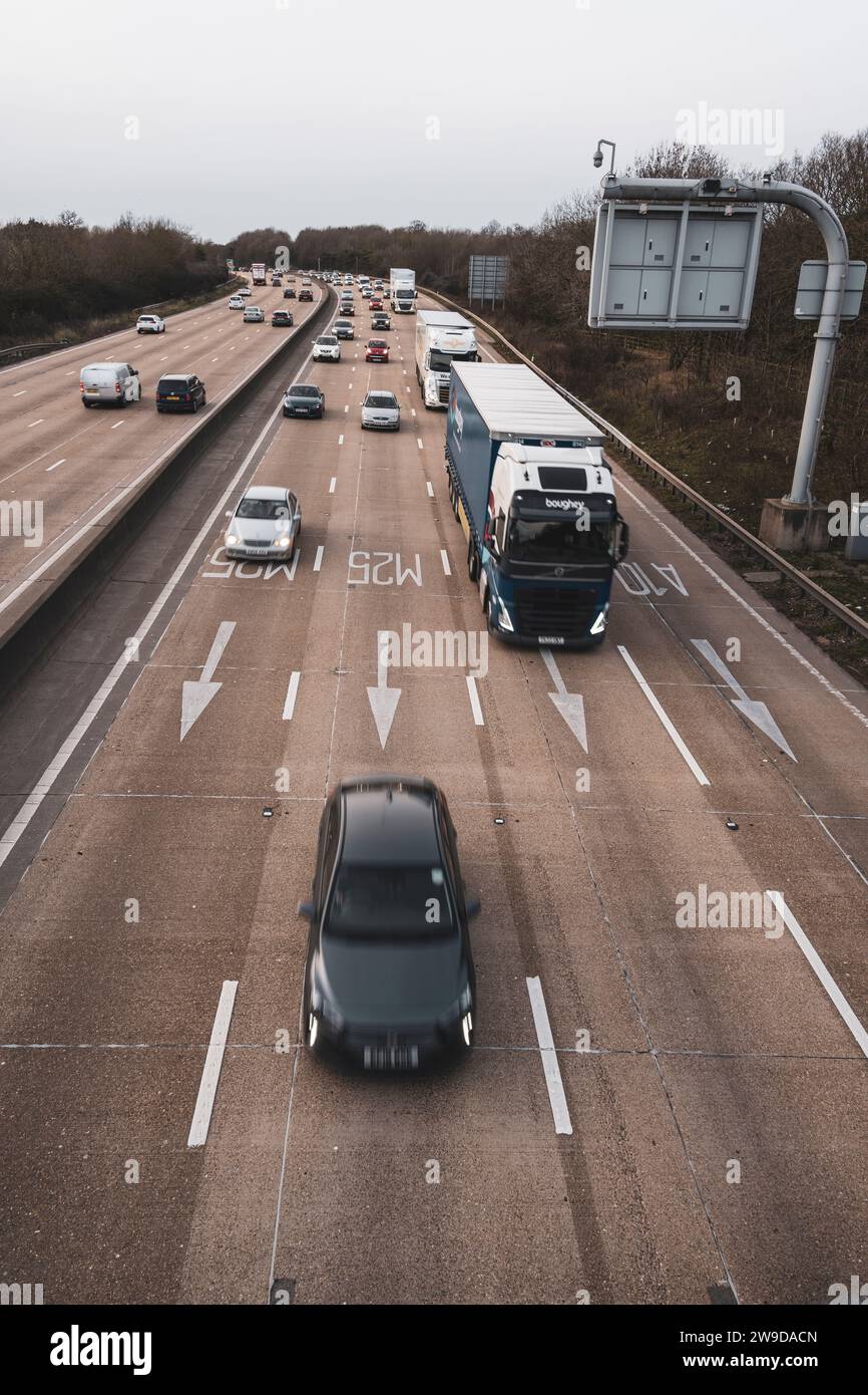 Cars and lorries are making their way to. and from London on the M25 ...
